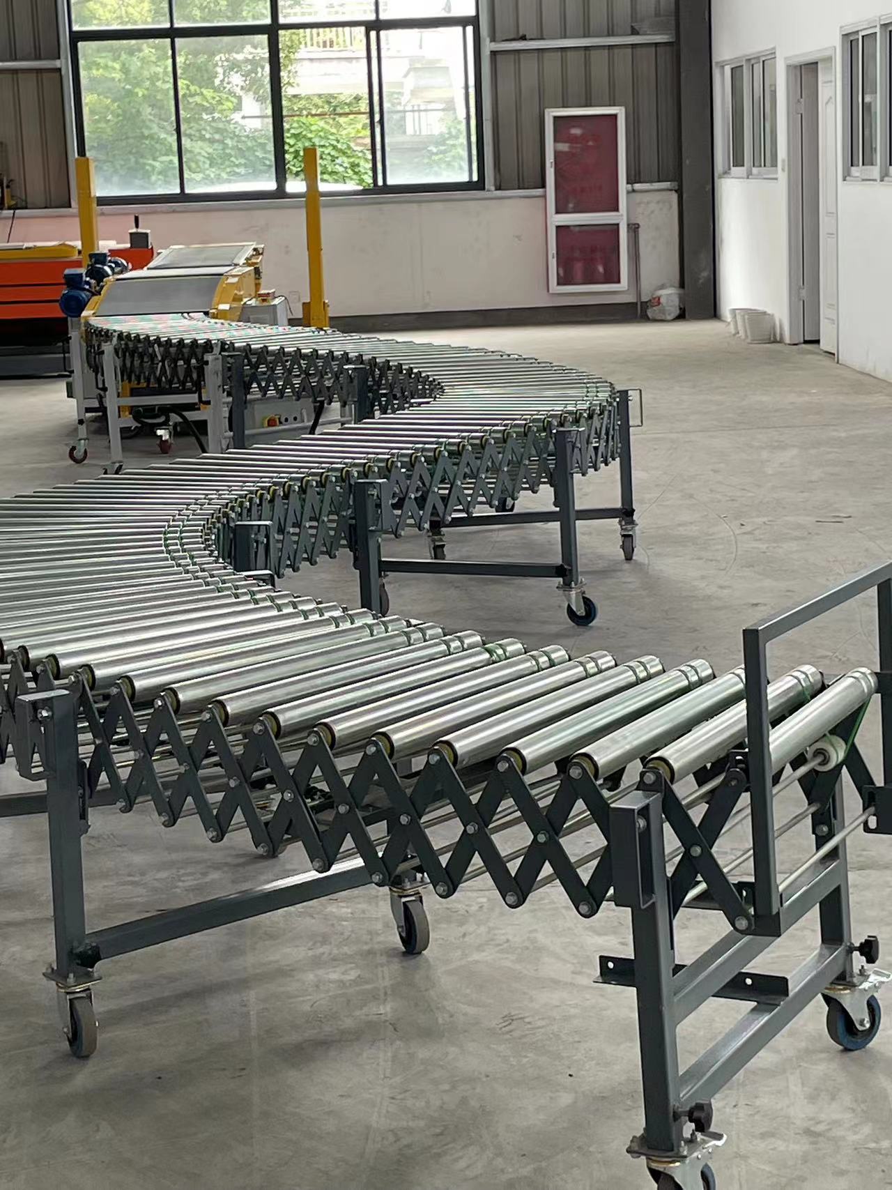 Telescopic Motorized Flexible Roller Conveyor – The Automation Solution ...